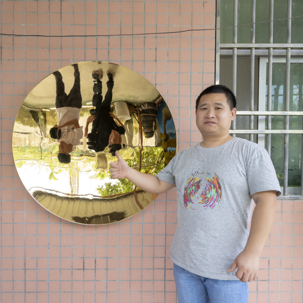 red Concave Mirror Sculpture at the Metropolitan Museum of Art